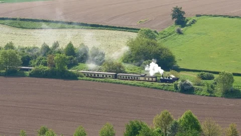 Steam train driving trough Wittem in Sou... | Stock Video | Pond5