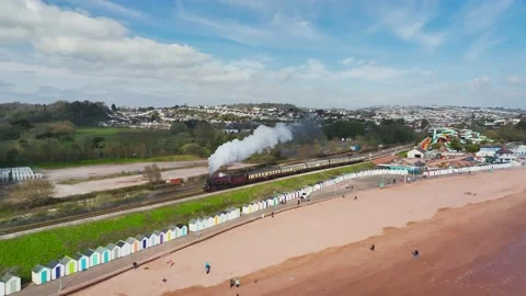 Steam Train over Goodrington Beach from ... | Stock Video | Pond5