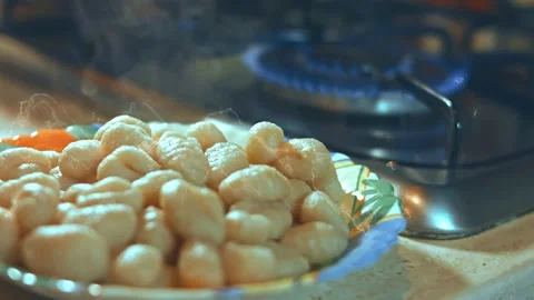 Steam transformation effect of Gnocci wi... | Stock Video | Pond5