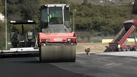 Steamroller compactor apisionating new t... | Stock Video | Pond5