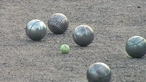 Steel balls, boules, rolling up to the c... | Stock Video | Pond5