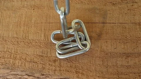 Steel chain falling down from top to bot... | Stock Video | Pond5