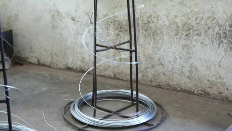 Steel reinforcement coils are wrapped us... | Stock Video | Pond5