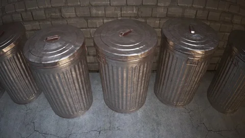 "Steel trash bins stacked together in an... | Stock Video | Pond5