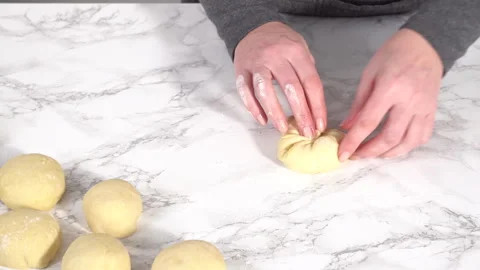 Step by step. Dividing bread dough to ba... | Stock Video | Pond5