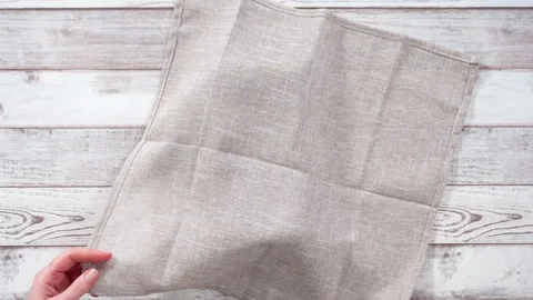 Step by step. Folding natural color line... | Stock Video | Pond5
