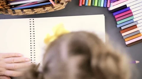 Step by step. Little girl tracing her ha... | Stock Video | Pond5