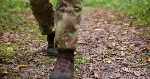 steps of a soldier in berets through the... | Stock Video | Pond5