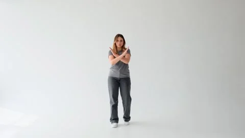 Stern Woman Showing Stop Sign With Cross... | Stock Video | Pond5