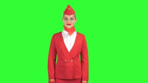 Stewardess in a red suit winks a slight ... | Stock Video | Pond5