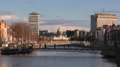 Still shot wide of people walking over a... | Stock Video | Pond5