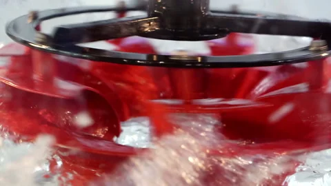 Stirring water using a rotating element | Stock Video | Pond5