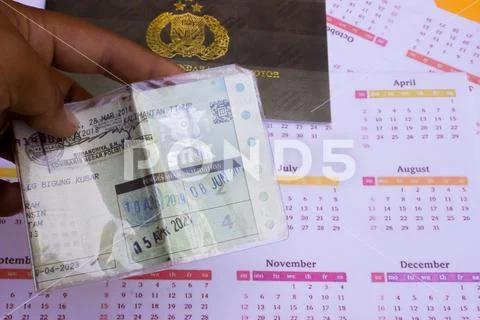 STNK with the concept of paying vehicle tax with a calendar background ...