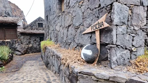 Stone Path Leads Through Lava Village in... | Stock Video | Pond5