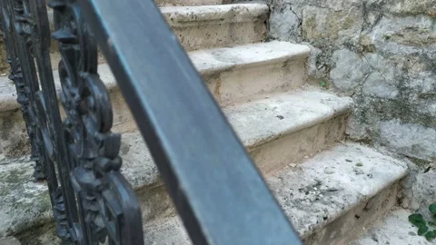 Stone steps worn down from foot traffic.... | Stock Video | Pond5