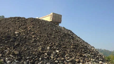 Stone stuck in dump truck unloading | Stock Video | Pond5