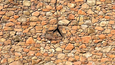 Stone wall collapse, stone wall destruct... | Stock Video | Pond5