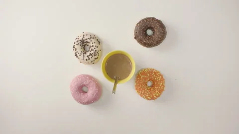 stop motion animation of donuts rotating... | Stock Video | Pond5