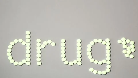 Stop motion word text drug drugs on lila... | Stock Video | Pond5