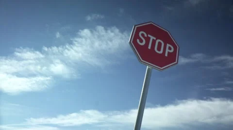stop sign with clouds | Stock Video | Pond5