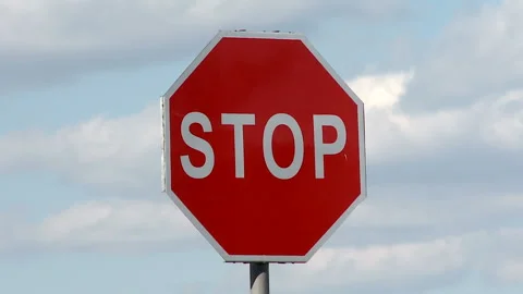 Stop sign on the fence. Warning. Road si... | Stock Video | Pond5