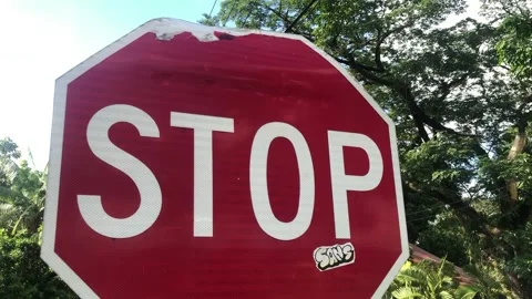 STOP SIGN. RED HEXAGON SHAPED STOP SIGN ... | Stock Video | Pond5