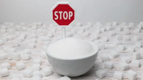 Stop sign on a table with a bowl full of... | Stock Video | Pond5