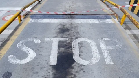 stop sign, word on roadway, concrete, ro... | Stock Video | Pond5