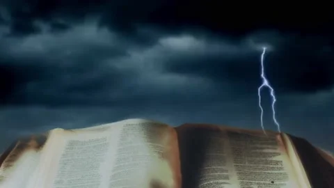 Storm clouds over open Bible looping bac... | Stock Video | Pond5