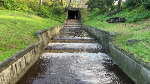 Stormwater channel river flowing with li... | Stock Video | Pond5