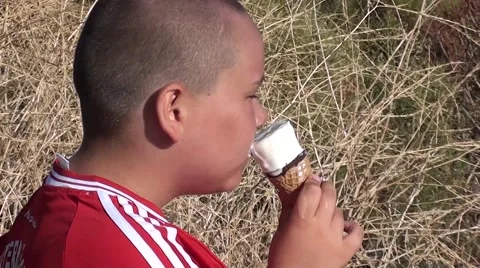 Greedy Kid Stock Footage ~ Royalty Free Stock Videos | Pond5