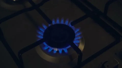 Stovetop, gas ring fire goes out in dark... | Stock Video | Pond5