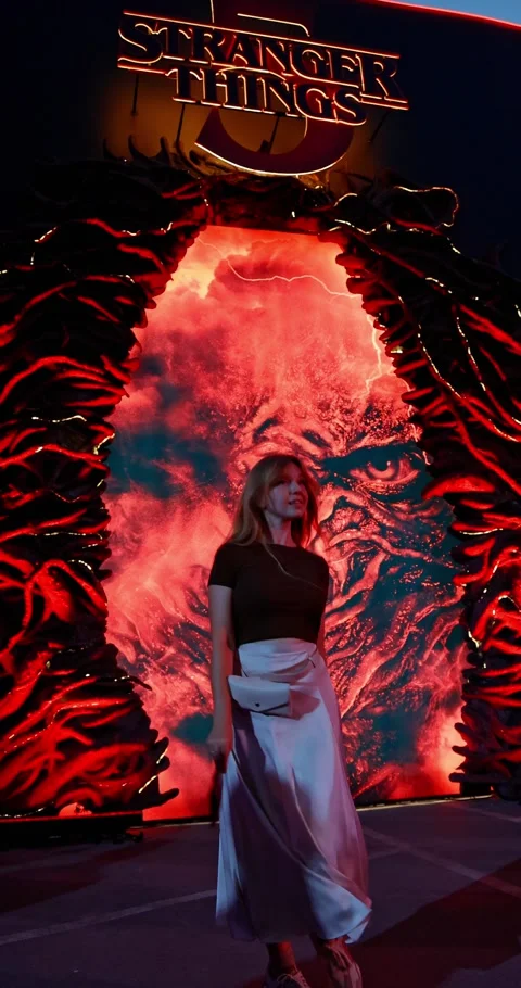 Stranger Things Fan Posing at Vecna Gate... | Stock Video | Pond5
