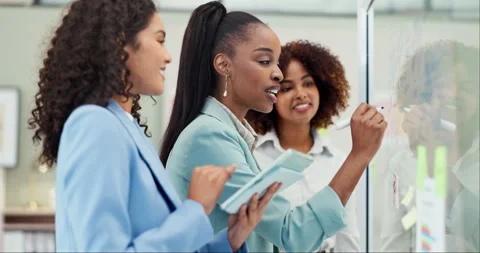 Strategy, women writing on board and tab... | Stock Video | Pond5