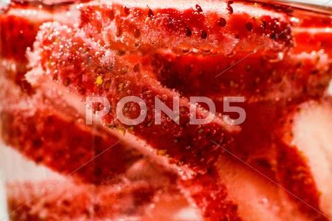 Photograph: Strawberry berry in water in vials of gas #66456272