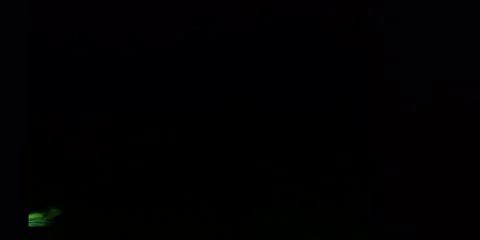 A stream of green liquid fire travels to... | Stock Video | Pond5