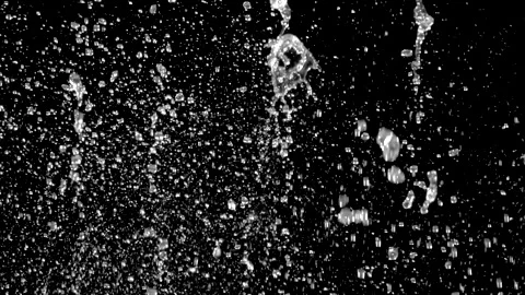 Stream spraying water drops. Drops of up... | Stock Video | Pond5