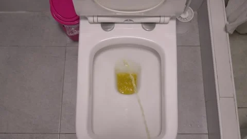 Stream of urine in toilet bowl, man shoo... | Stock Video | Pond5
