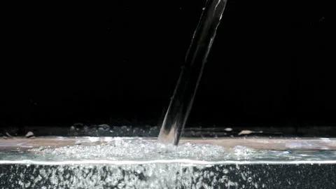 Stream of water drops down in aquarium o... | Stock Video | Pond5