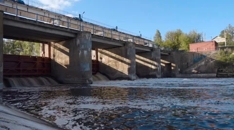 Streams of water on the river dam splash... | Stock Video | Pond5