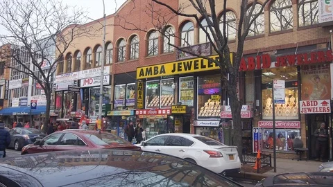 Street With Dry Trees, Shops And Cars - ... | Stock Video | Pond5