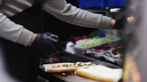 Street food, fast food. The process of m... | Stock Video | Pond5