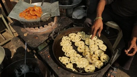 Street Food Vendor Selling Jalebi In Tra... | Stock Video | Pond5