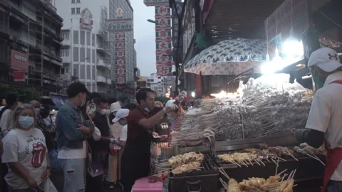 Street food vendor wear medical face mas... | Stock Video | Pond5