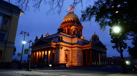 Street lights gradually switch on around... | Stock Video | Pond5