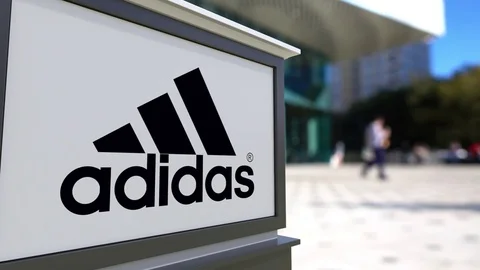 Street signage board with Adidas inscrip... | Stock Video | Pond5
