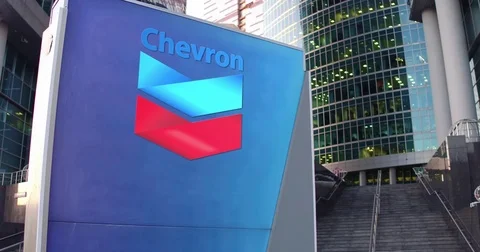 Street signage board with Chevron Corpor... | Stock Video | Pond5