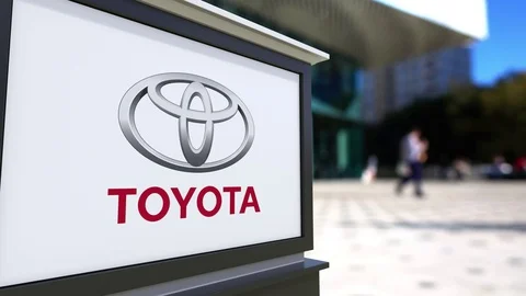 Street signage board with Toyota logo. B... | Stock Video | Pond5