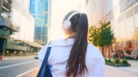 Street style outdoor. Back view of beaut... | Stock Video | Pond5