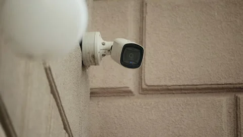 Street view of modern CCTV camera on bui... | Stock Video | Pond5